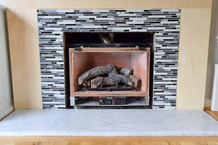 How to Tile a Fireplace (even if it's brick!) - The Handyman's Daughter