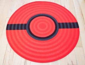 How to Paint a Rug [DIY Poké Ball Rug] - The Handyman's Daughter