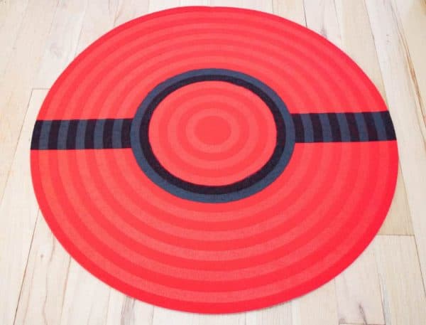 How to Paint a Rug [DIY Poké Ball Rug] - The Handyman's Daughter