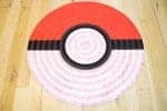 How to Paint a Rug [DIY Poké Ball Rug] - The Handyman's Daughter
