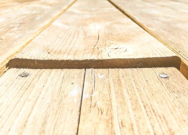 How to Fix Warped Deck Boards - The Handyman's Daughter