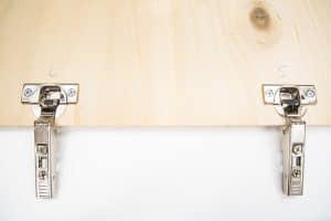How to Use a Concealed Hinge Jig on New Cabinet Doors - The Handyman's ...