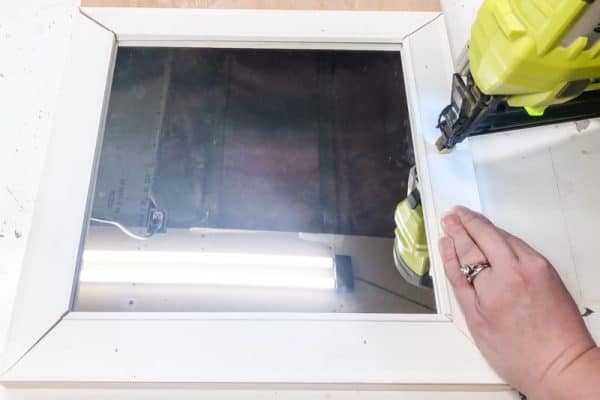 How to Frame a Mirror with Wood Trim - The Handyman's Daughter