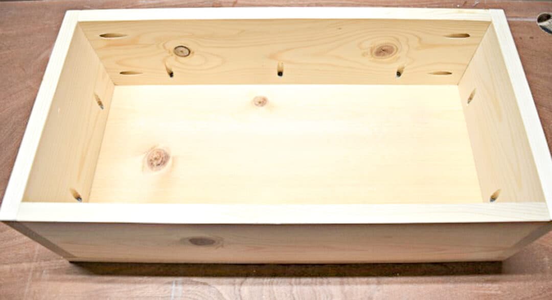 How to Add a Pull Out Trash Can to a Cabinet - The Handyman's Daughter