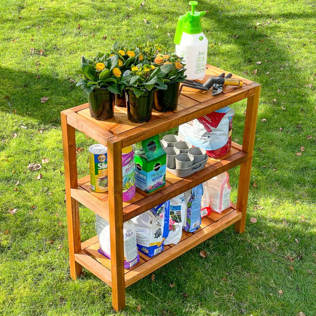 DIY Outdoor Plant Stand with Arbor - The Handyman's Daughter