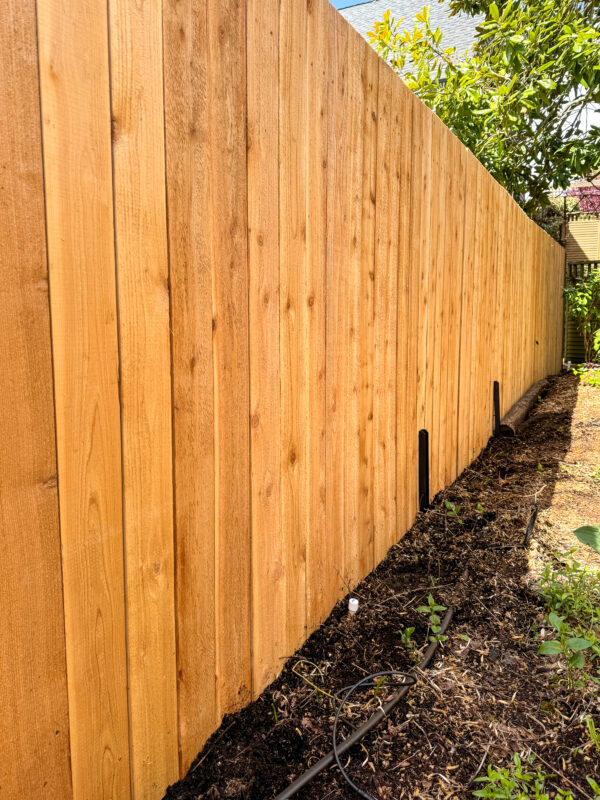 How to Fix a Leaning Fence (the LAZY way!) - The Handyman's Daughter