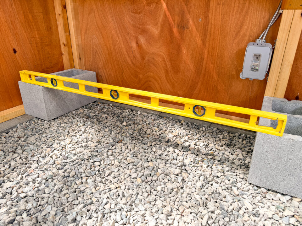 Super Easy DIY Cinder Block Shelves - The Handyman's Daughter